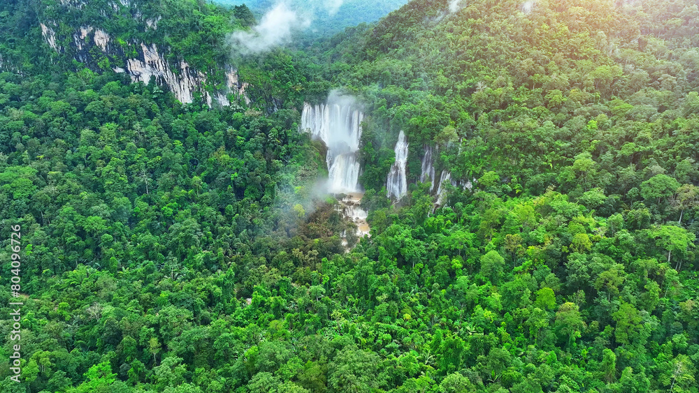 Aerial Wonder: Behold the hidden wonder of a secluded waterfall ...