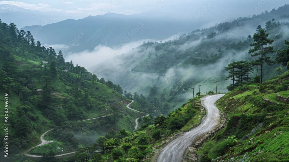 Cloudy sky and curve of Himalayan road, monsoon landscape of Garhwal ...