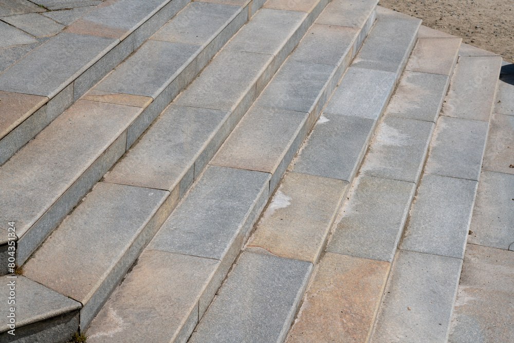 wide staircase with granite steps, fan-shaped opening with elements of ...