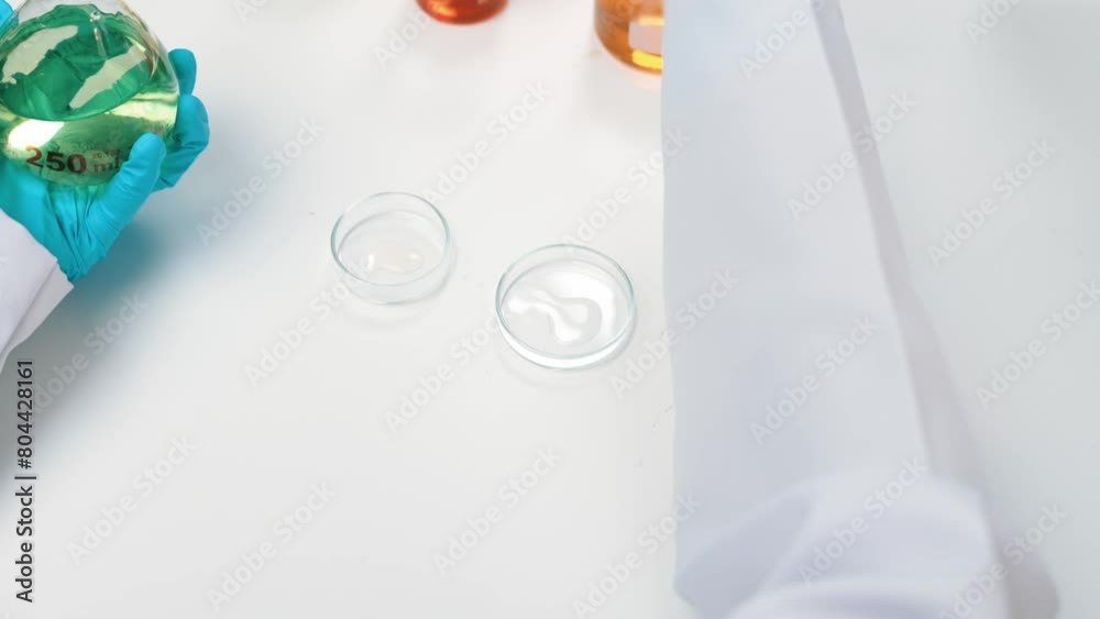 Scientific laboratory researcher drop liquid sample on microscopic ...