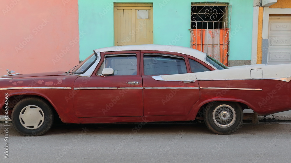 Red-maroon white almendron car -Dodge classic from 1958- stationed ...