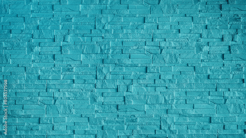 stone cladding wall made of regular light blue bricks. abstract wall ...