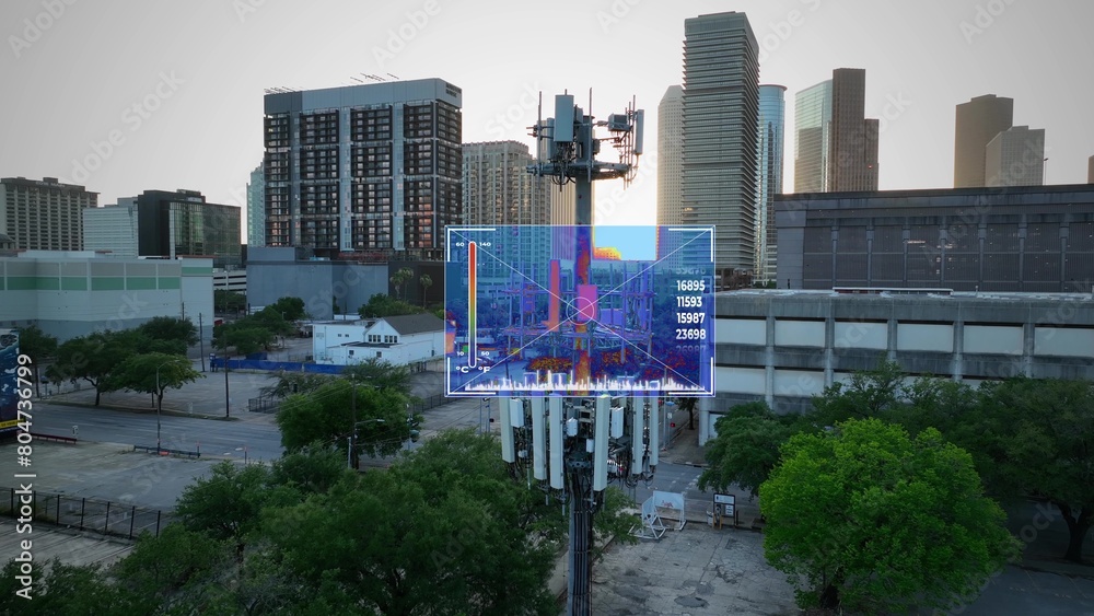 Thermal drone imaging of telecommunication tower in urban city in USA ...