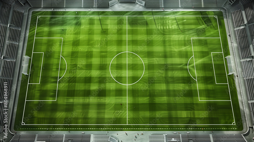 A top view of the lush green grass on an outdoor soccer field ...