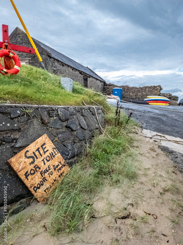 Sign explaining where to find the toilet at Portnoo harbour - County ...