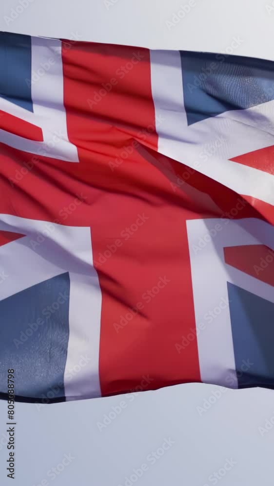 Union Jack flag in mid-wave, symbolizing the enduring spirit and pride ...