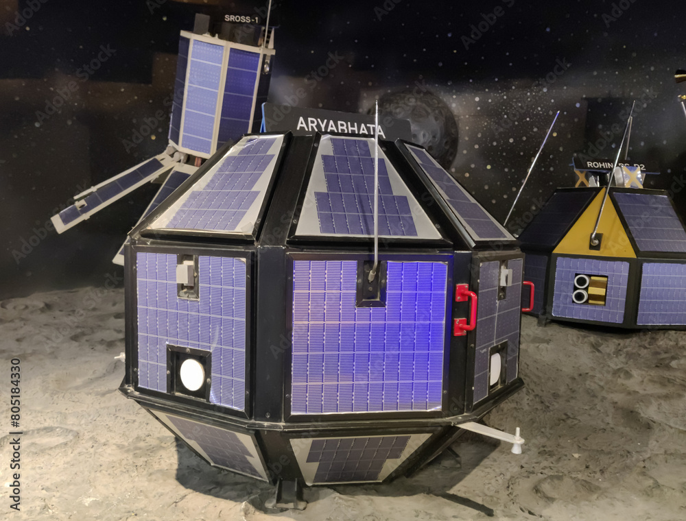 A model of Aryabhata, India’s pioneering satellite, stands out with its ...