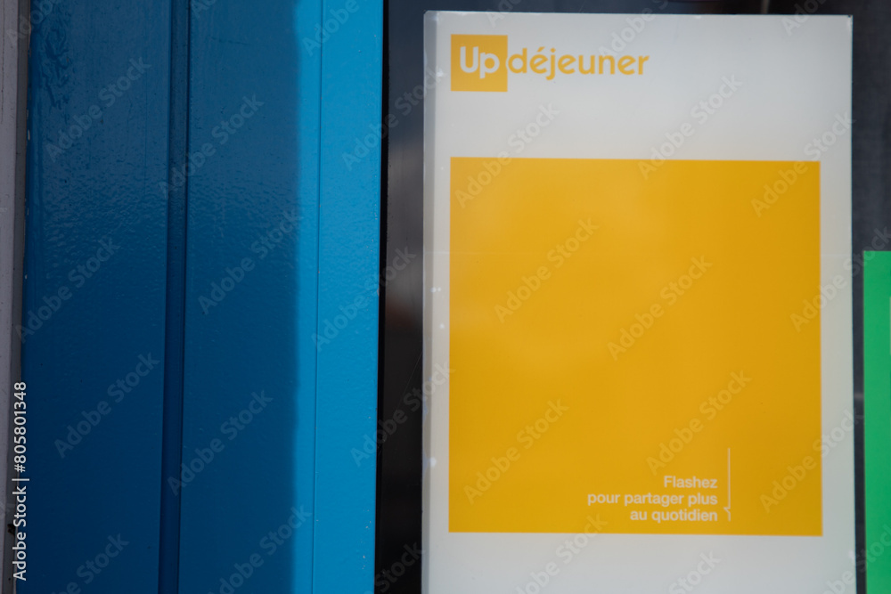 up dejeuner logo brand yellow and text sign label on windows facade ...