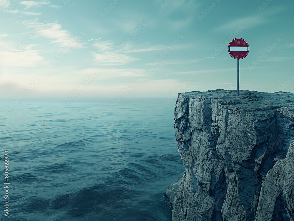 A symbolic no entry sign stands on a rugged seaside cliff against a ...