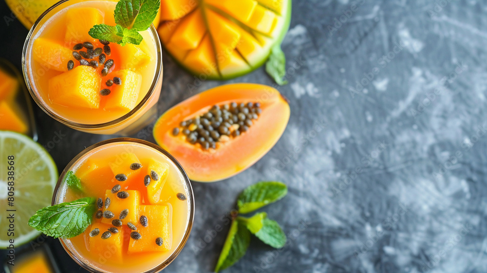 Two Fresh summer tropical fruit drinks. Mango smoothie or juice, non ...