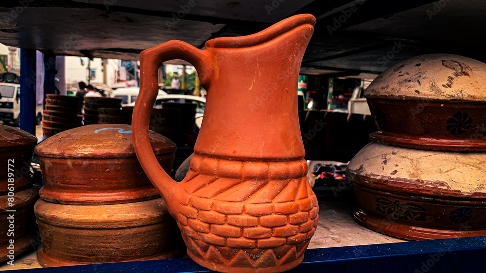 Handmade ceramic clay-based earthenware used for drinking and cooking ...