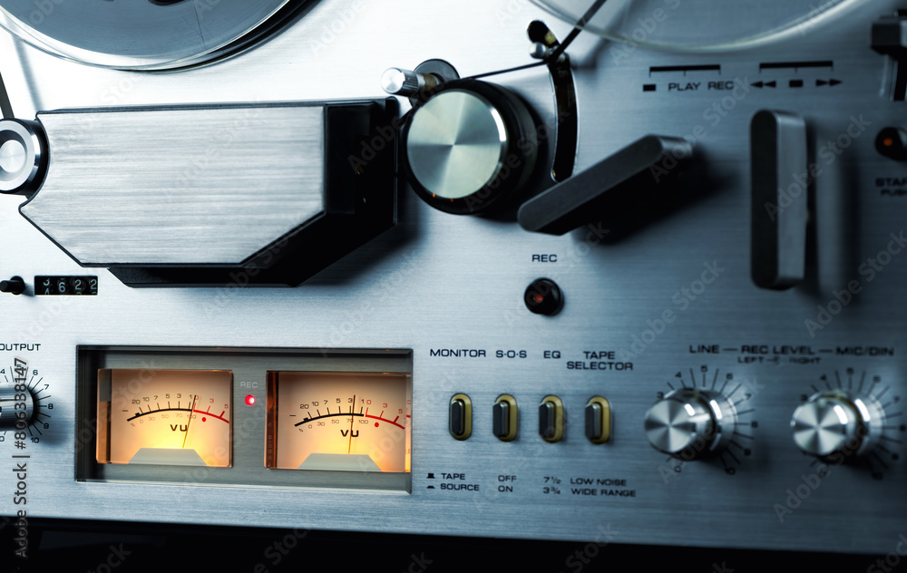 Arrow indicators of the recording level on a reel-to-reel tape recorder ...
