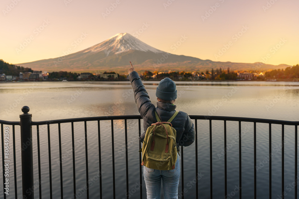 Woman tourist with Fuji Mountain at Lake Kawaguchi, happy Traveler ...