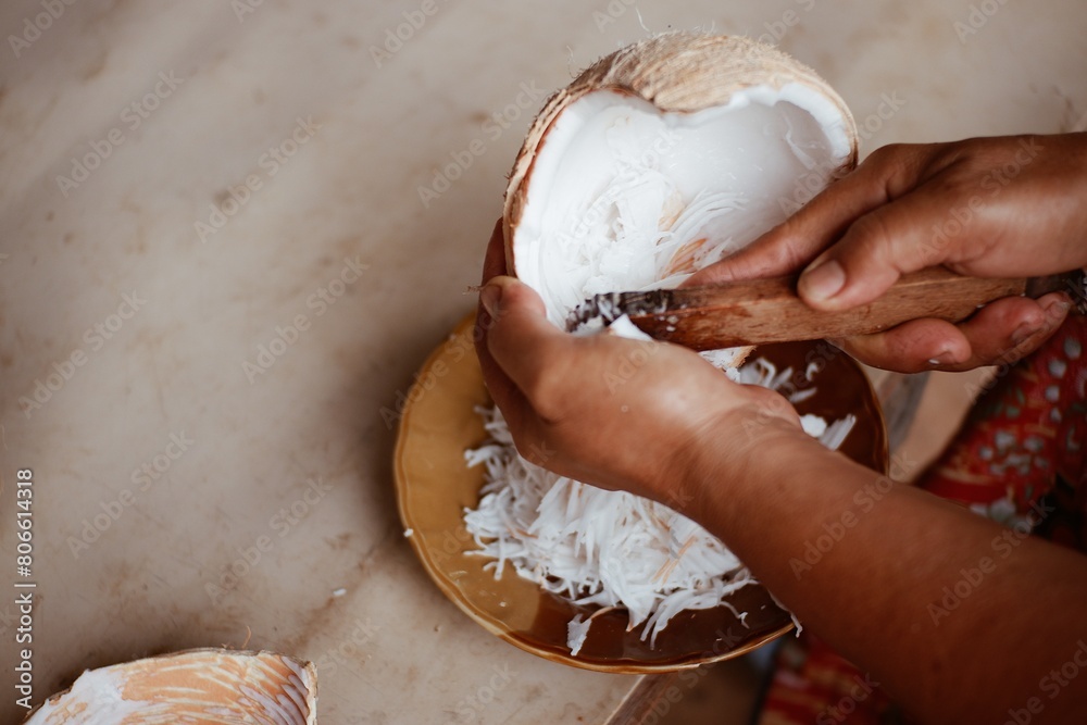 people are using grated coconut to make a tool for coconut milk as ...