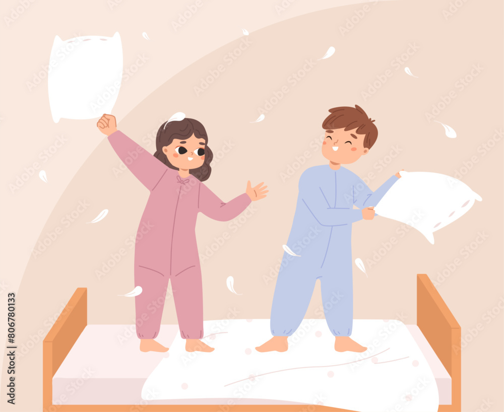 Kids pillow fight on bed. Siblings playing and wearing pajamas. Funny ...