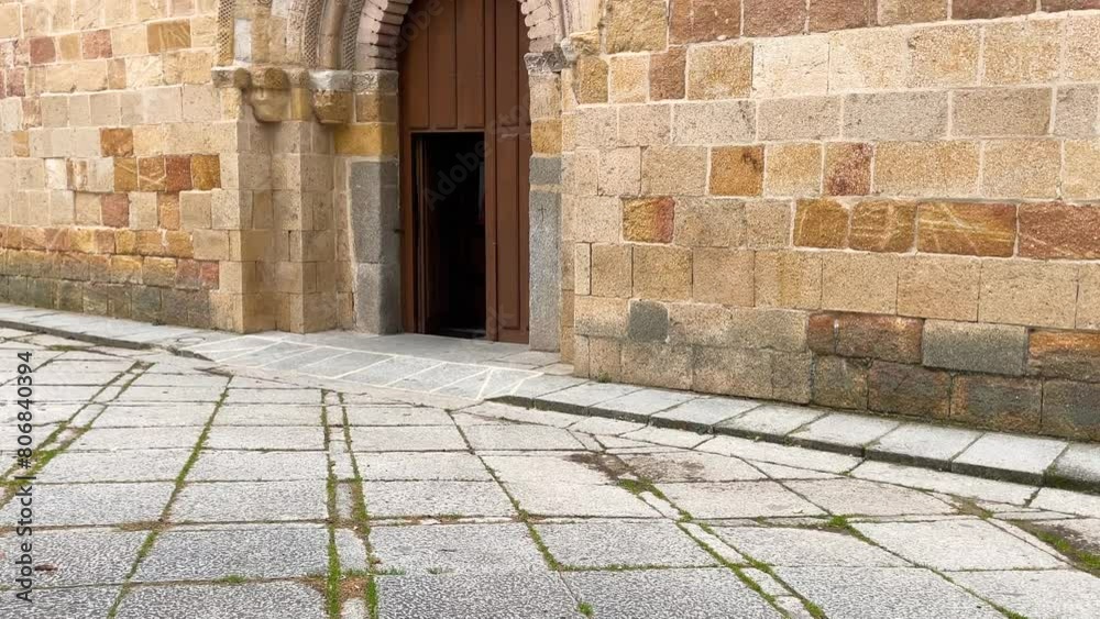 filming of the portico of the church of San Nicolas in Avila, there is ...