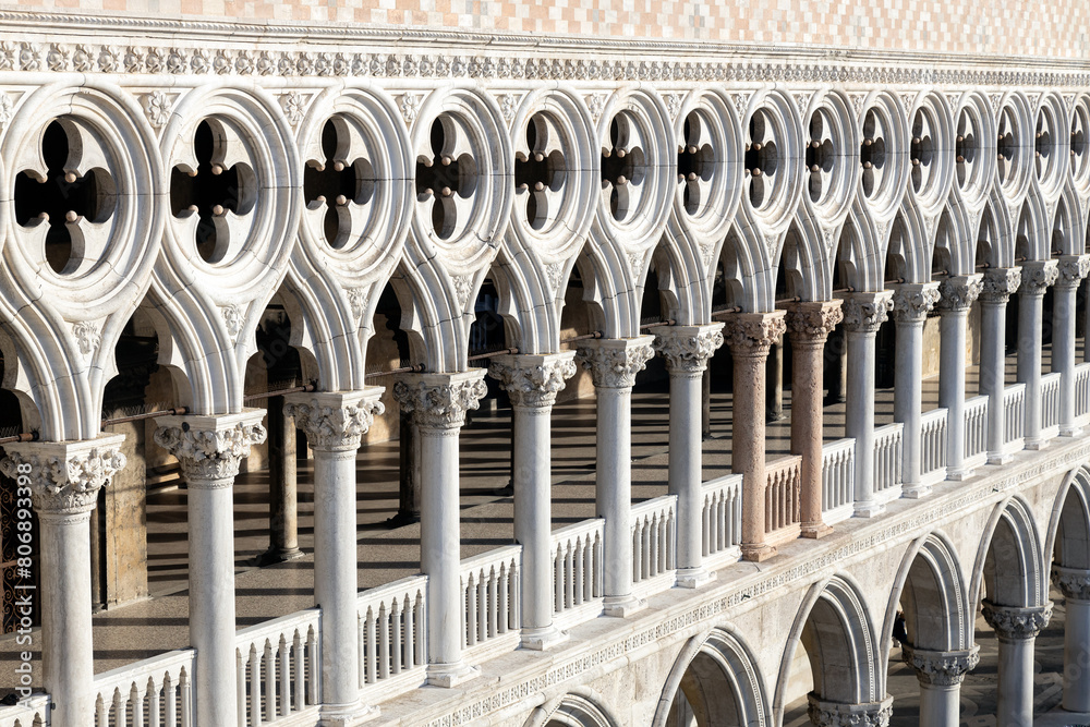 Architectural details and row of gothic columns of Doge's Palace at St ...
