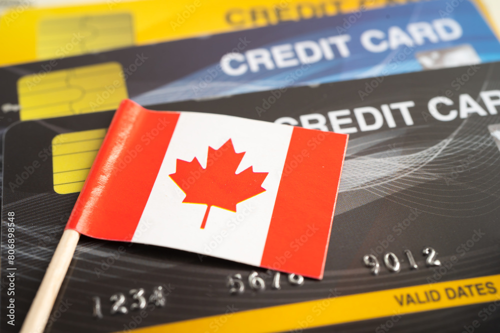 Credit card model with Canada flag, financial investment economy ...
