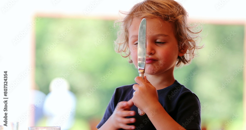Little boy playing with knife mother removes dangerous knife from hand ...