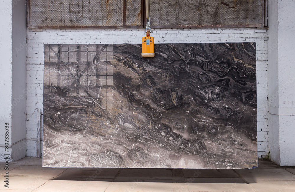 Picture of a marble slab on a hanger, shot in natural light, a cut of ...