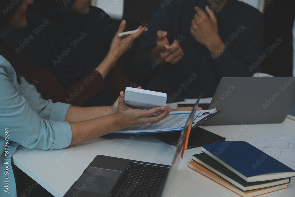 Team of business people working together in the meeting room office ...