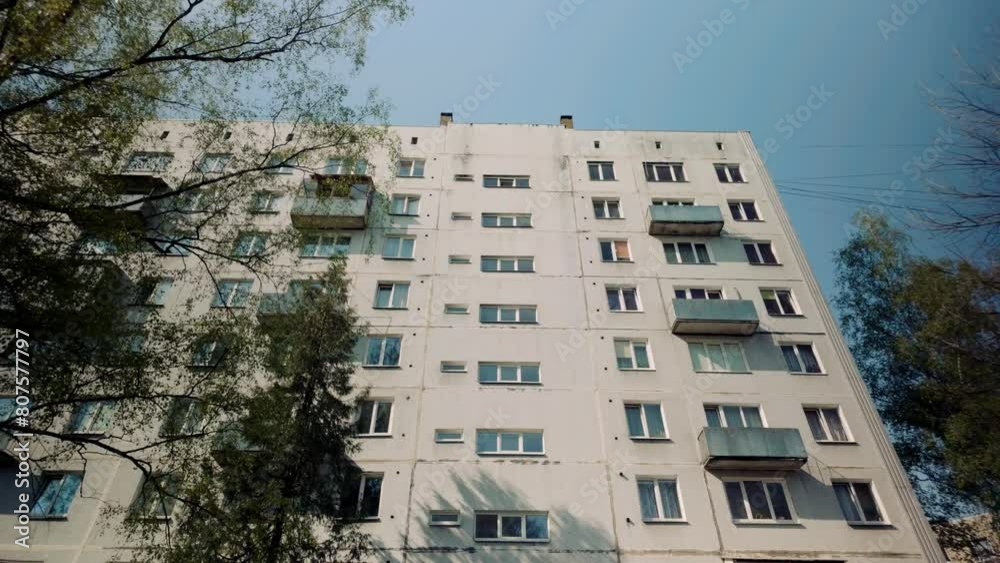 Low angle view on high rise Soviet era residential apartment building ...