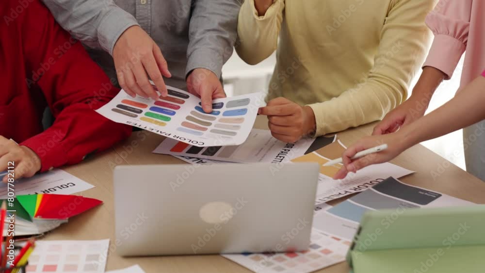 Designer team brainstorming and choosing color for graphic design ...