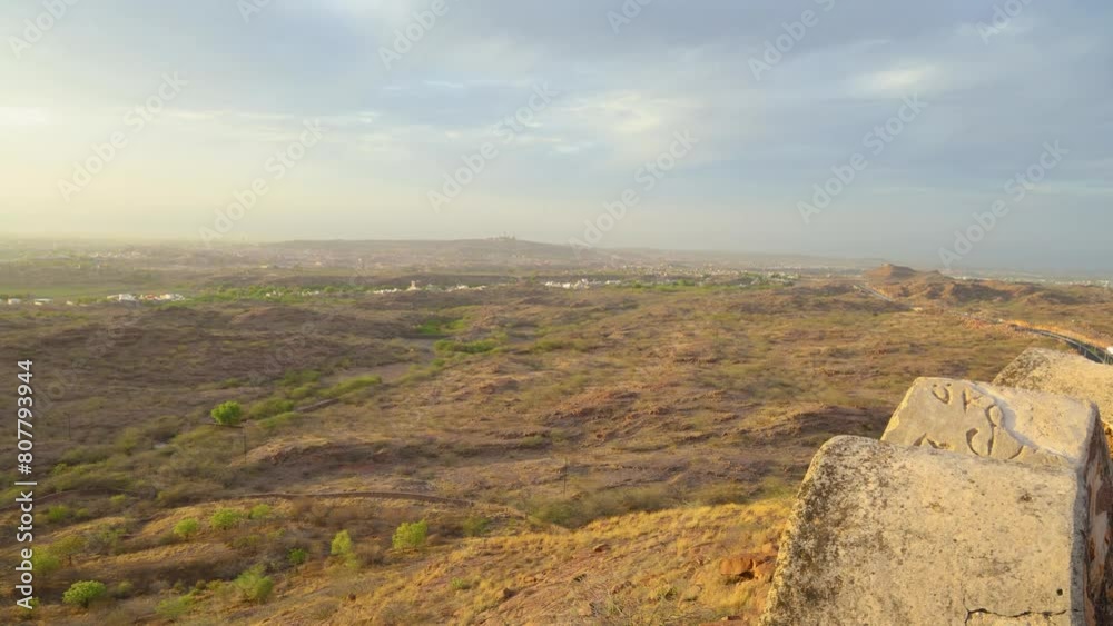ancient fort protection wall with dry mountain terrain and dramatic ...