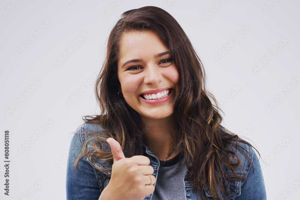 Happy, portrait and girl with thumbs up support in studio for thank you ...