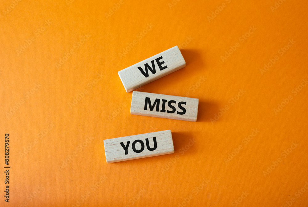 We Miss You Symbol Concept Words We Miss You On Wooden Blocks Beautiful Orange Background