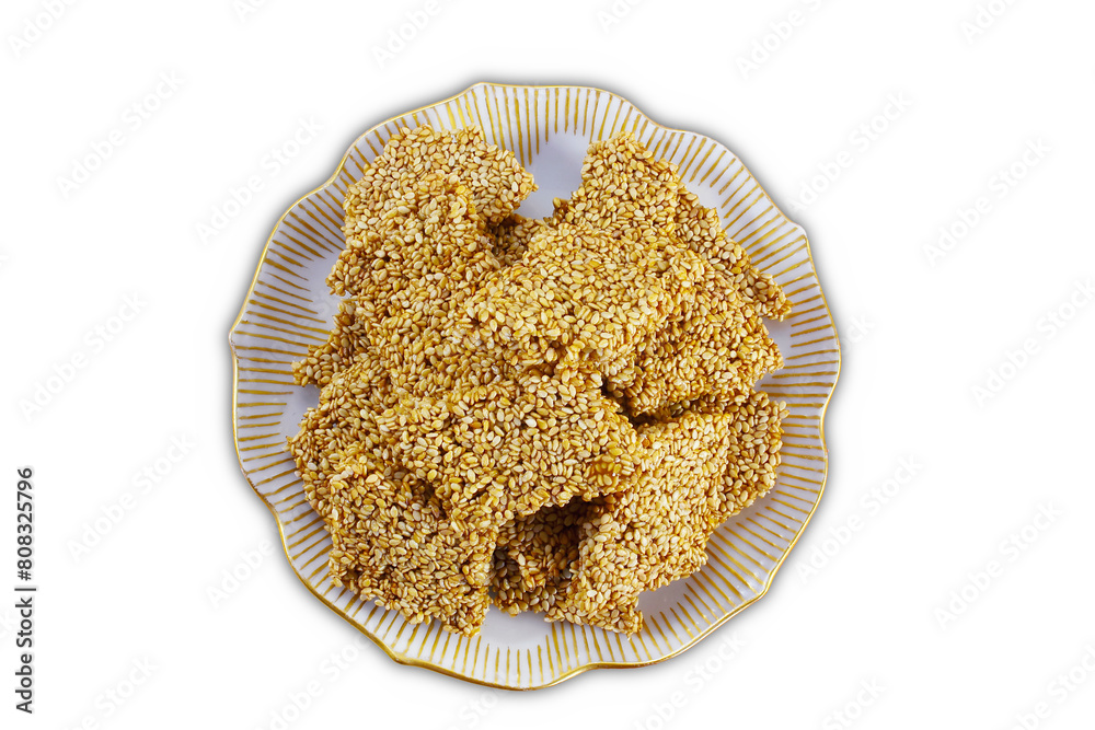 indian gujarati traditional festival sweet til chikki or til laddu,til ...