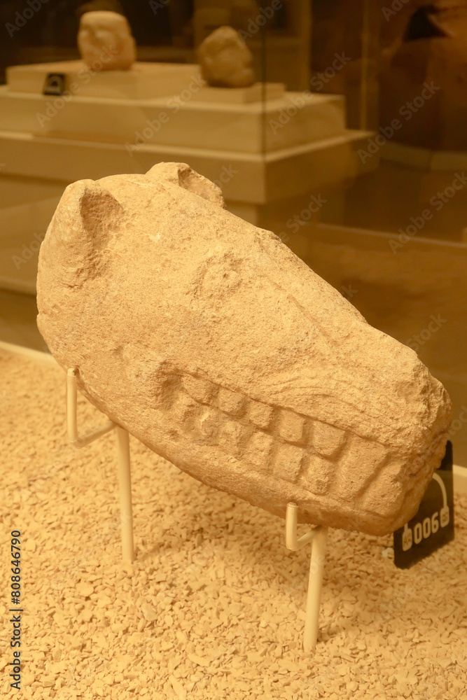 Neolithic stone sculpture, statue of a cat, feline, predator head ...