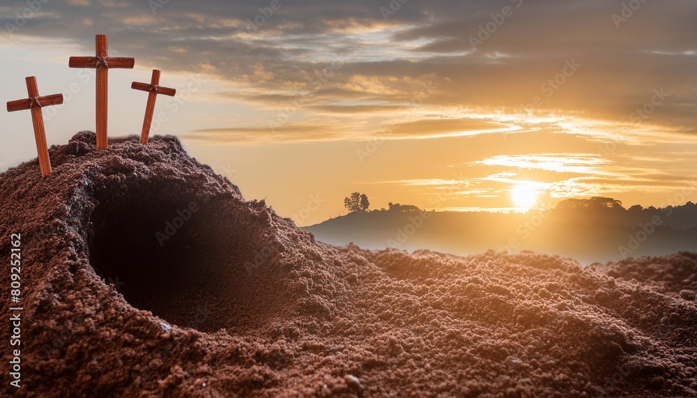 view from empty tomb at sunrise with three crosses on hill in the ...