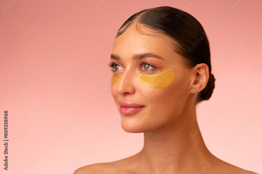 Beautiful young European woman with under eye patches with nourished ...