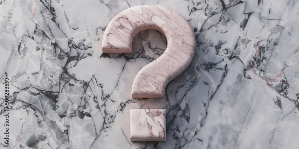 Big question mark made of pink stone on black and white marble stone ...