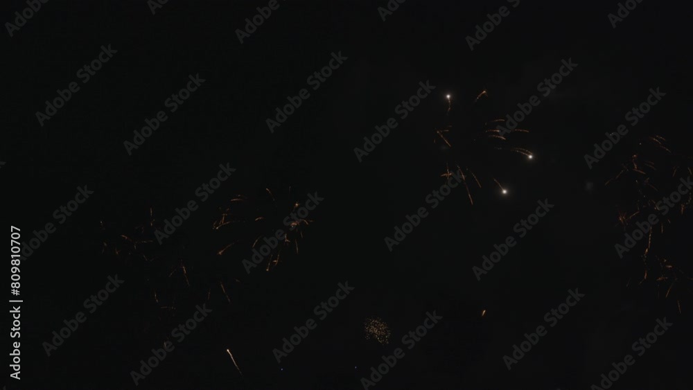 Vibrant fireworks burst over the water in Pattaya, painting the night ...