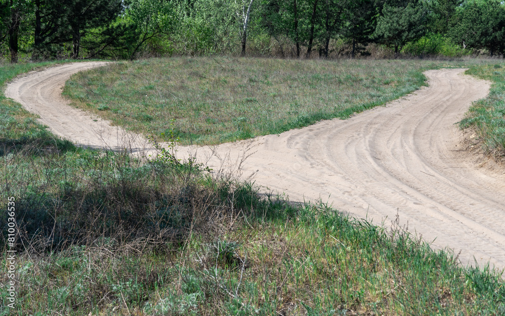 Sand road in the forest. Track imprint of quadricycle on nature land ...