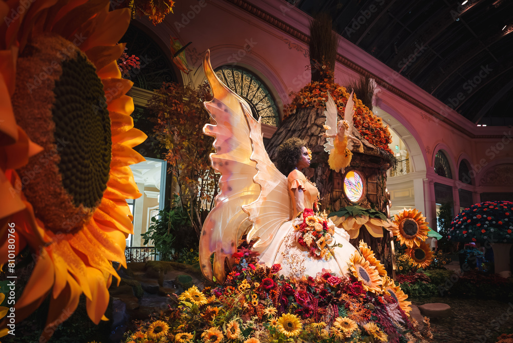 Colorful indoor fantasy display in Las Vegas with sunflowers, fairy ...