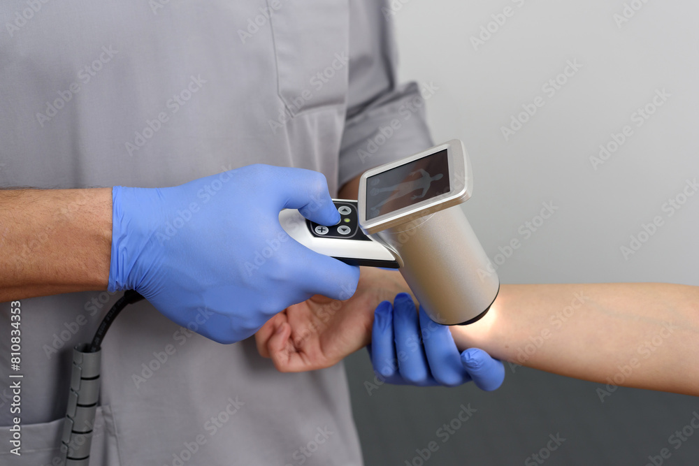 Digital dermatoscopy of moles. A dermatologist-oncologist examines the ...