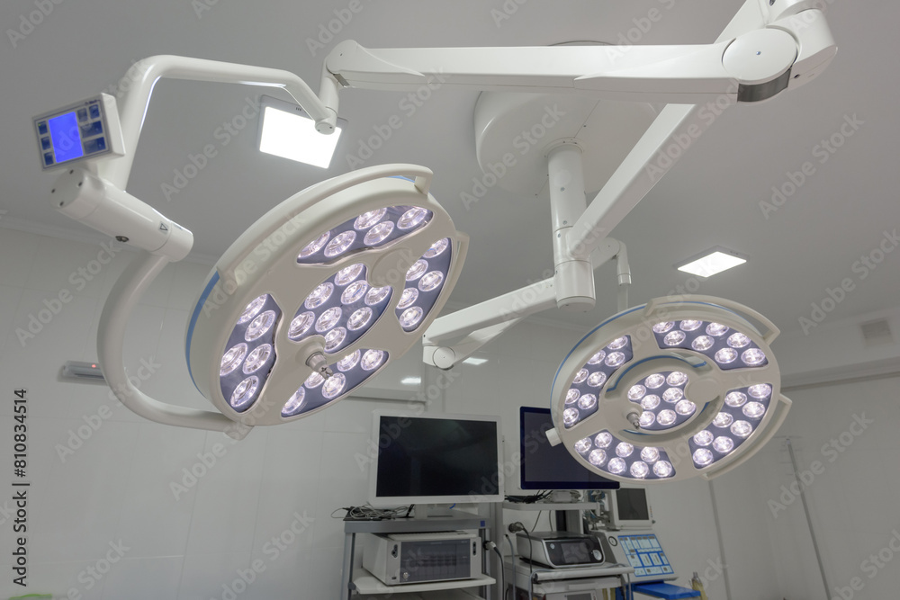 LED surgical lamp. Shadowless lamp shines in the operating room or ...