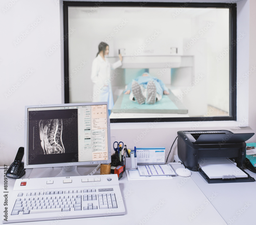 in the CT laboratory. Examination room in the office with a CT scanner ...