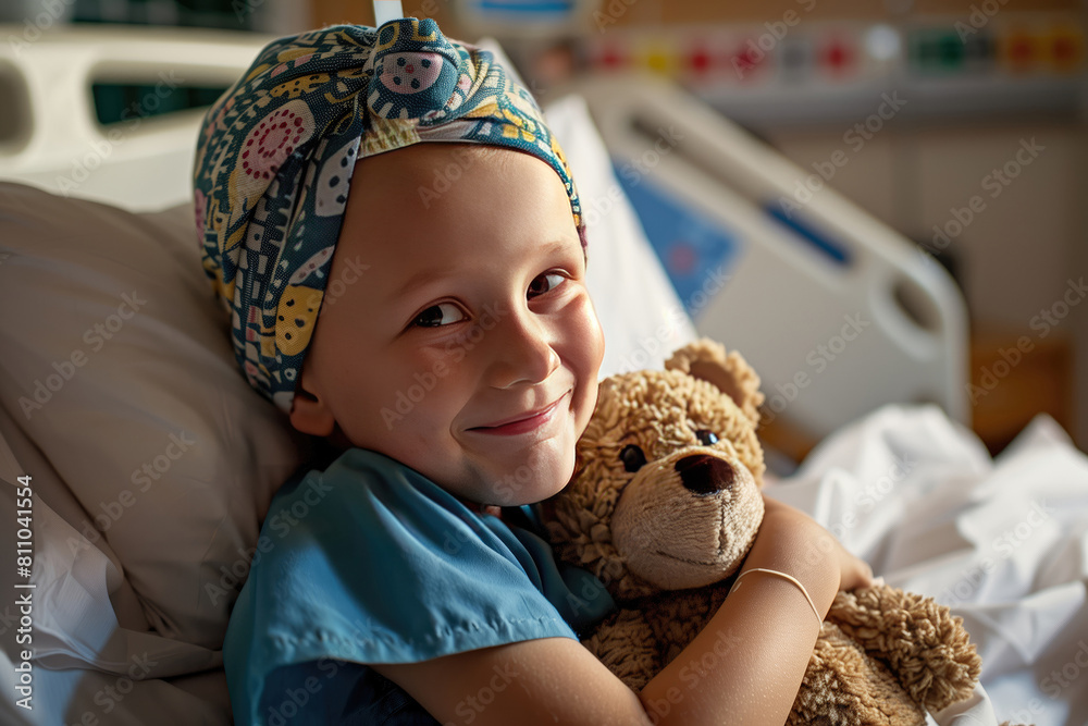 Sick child lying in bed in a hospital with his favorite stuffed toy ...