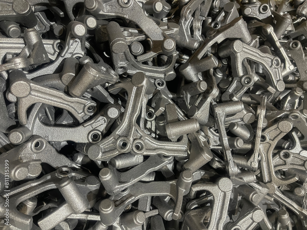 lot of iron die cast parts placed on mass, automotive parts mass ...