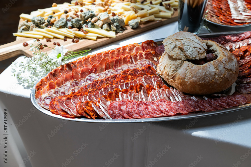 Tray of different types of Iberian sausages, red meat, fuet, chorizo ...