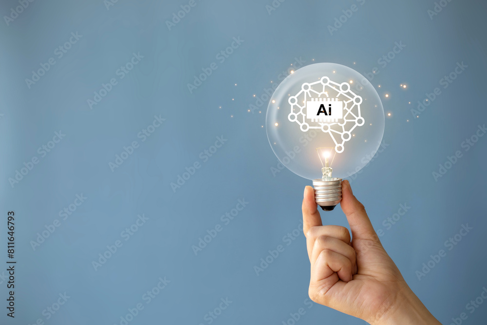 AI, Machine learning, Hand holding light bulb with virtual Artificial ...