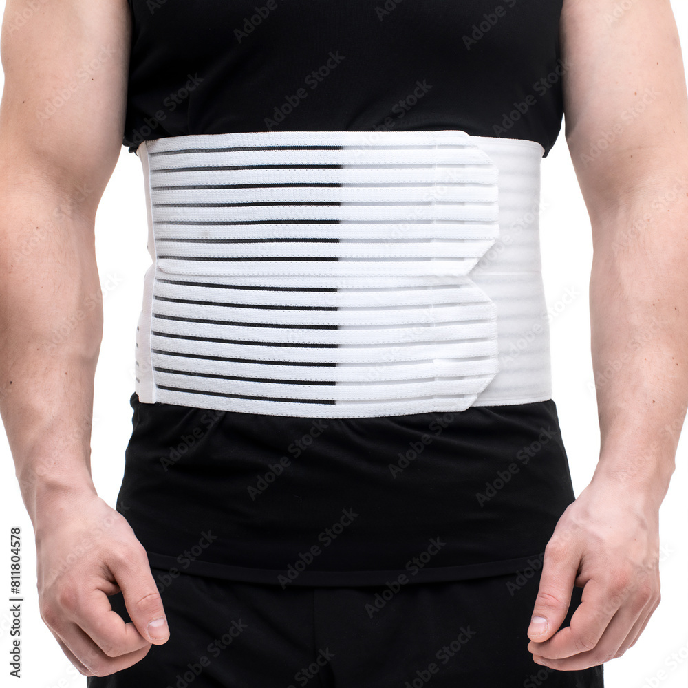 Lumbar brace on the sportsman body isolated on a white background ...