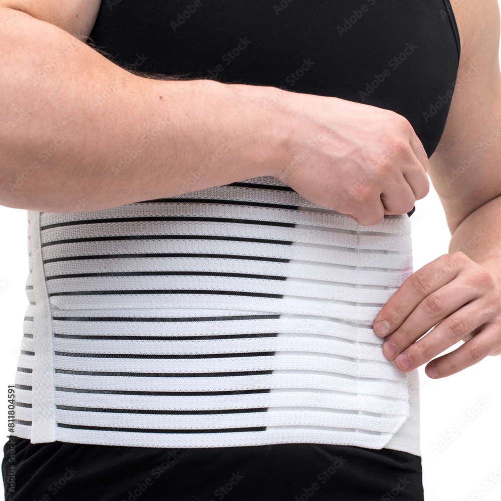 Lumbar brace on the sportsman body isolated on a white background ...