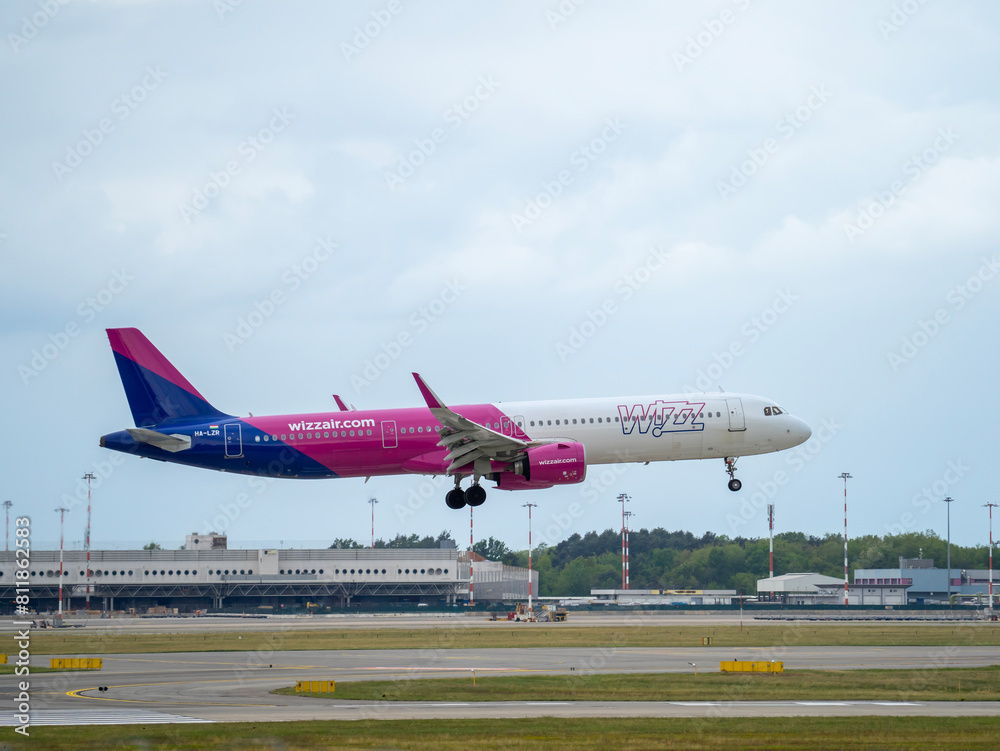 Wizzair Airbus A321 is landing at MXP Milano Malpensa international airport Stock Photo | Adobe ...