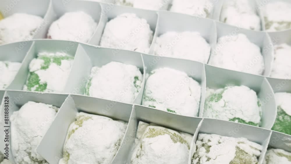 Mochi variants of various colors and flavors such as Pandan, Chocolate ...