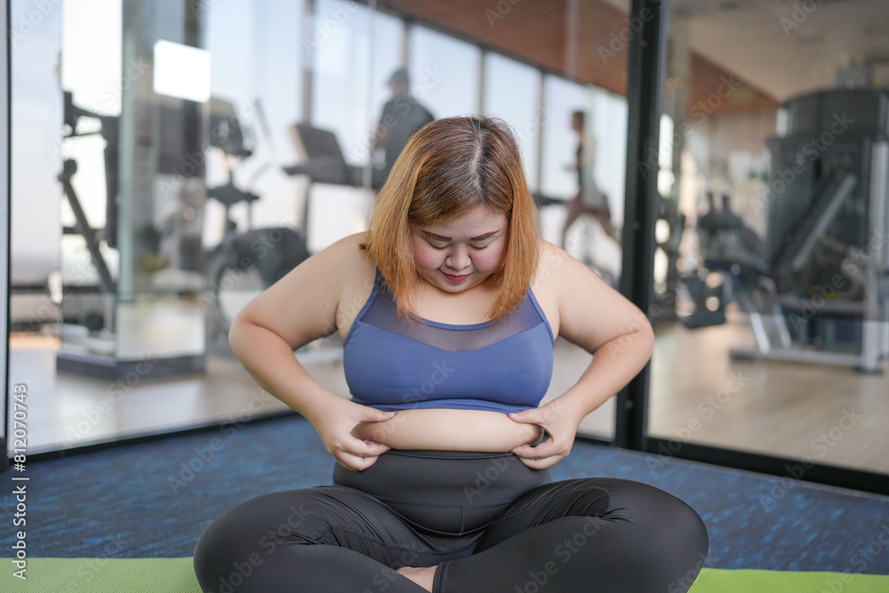 obese-woman-with-fat-upset-about-her-belly-overweight-woman-touching